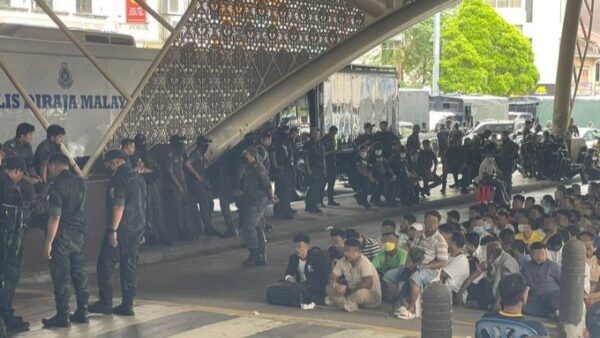 Police round up hundreds of undocumented migrants in massive raid at ...