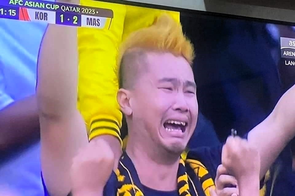 Harimau Malaya fan who sold motorbike to fly to Qatar to get new one as ...