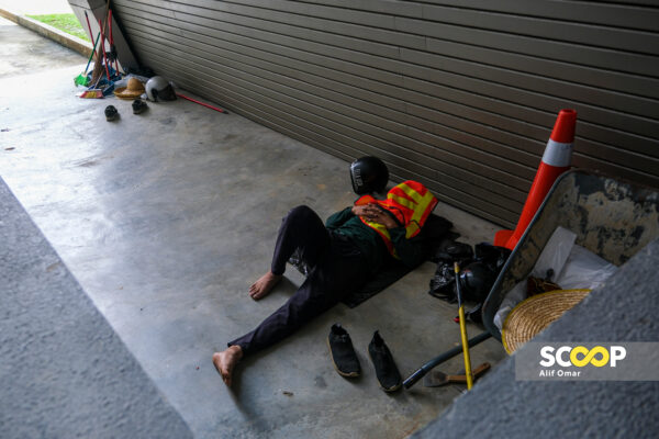Photo of the day: Short sidewalk slumber between work and hot weather ...