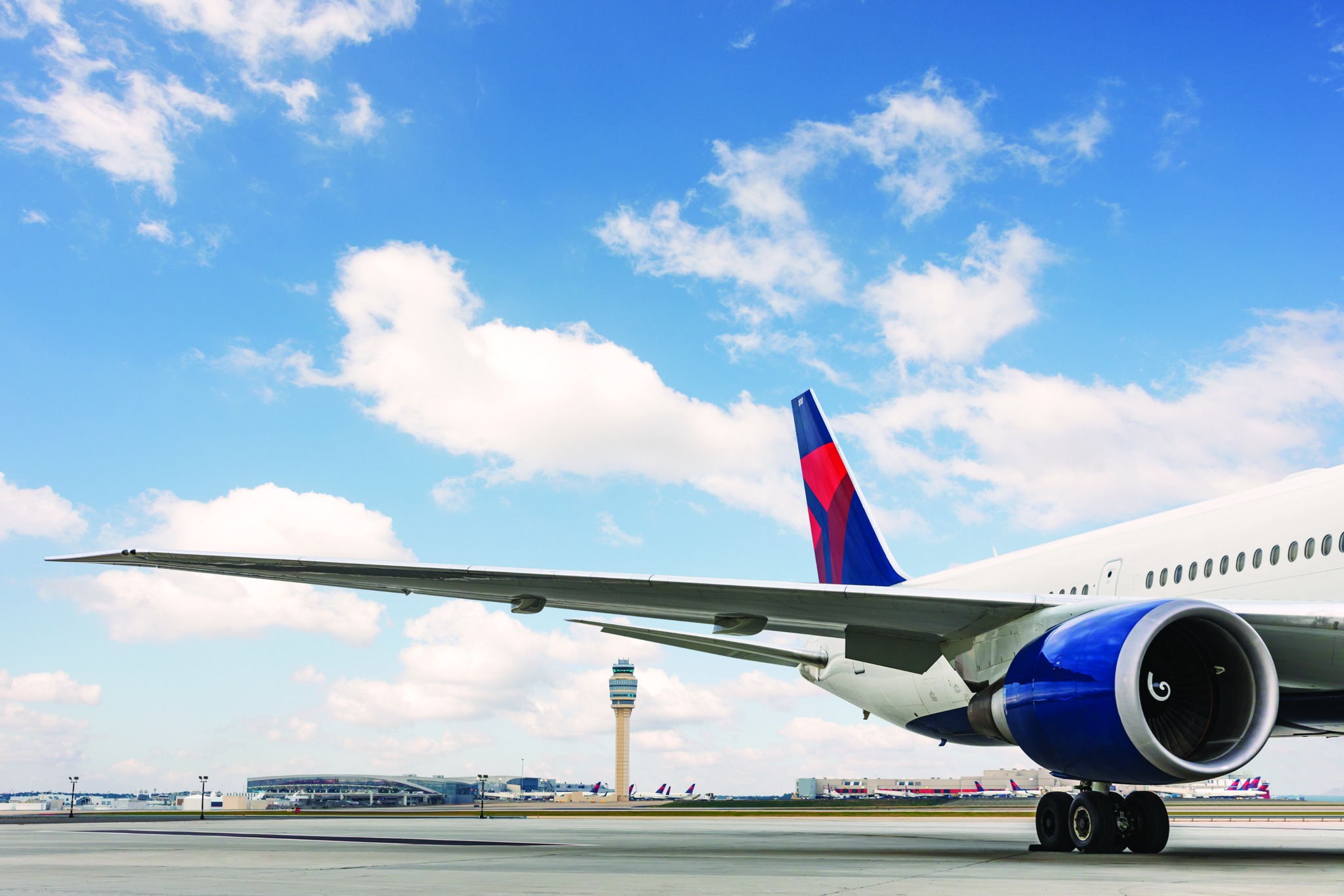 Delta flight makes emergency return after exit slide falls off Boeing ...