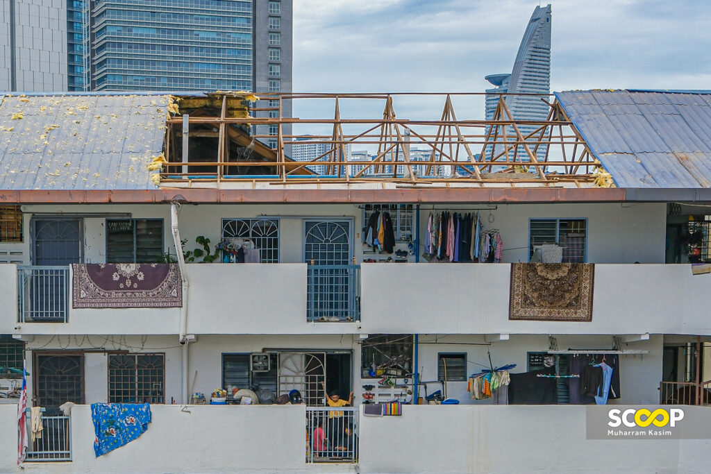 Photo of the Day: Putra Ria apartments' rooftops ravaged by storm's ...
