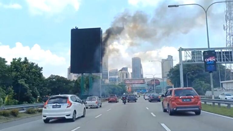Digital billboard catches fire, debris falls along Federal Highway | Scoop