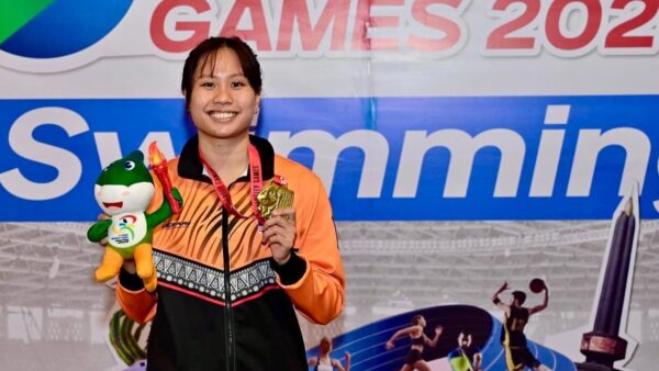 Jinq En takes swim break after AUG gold, silver wins | Scoop