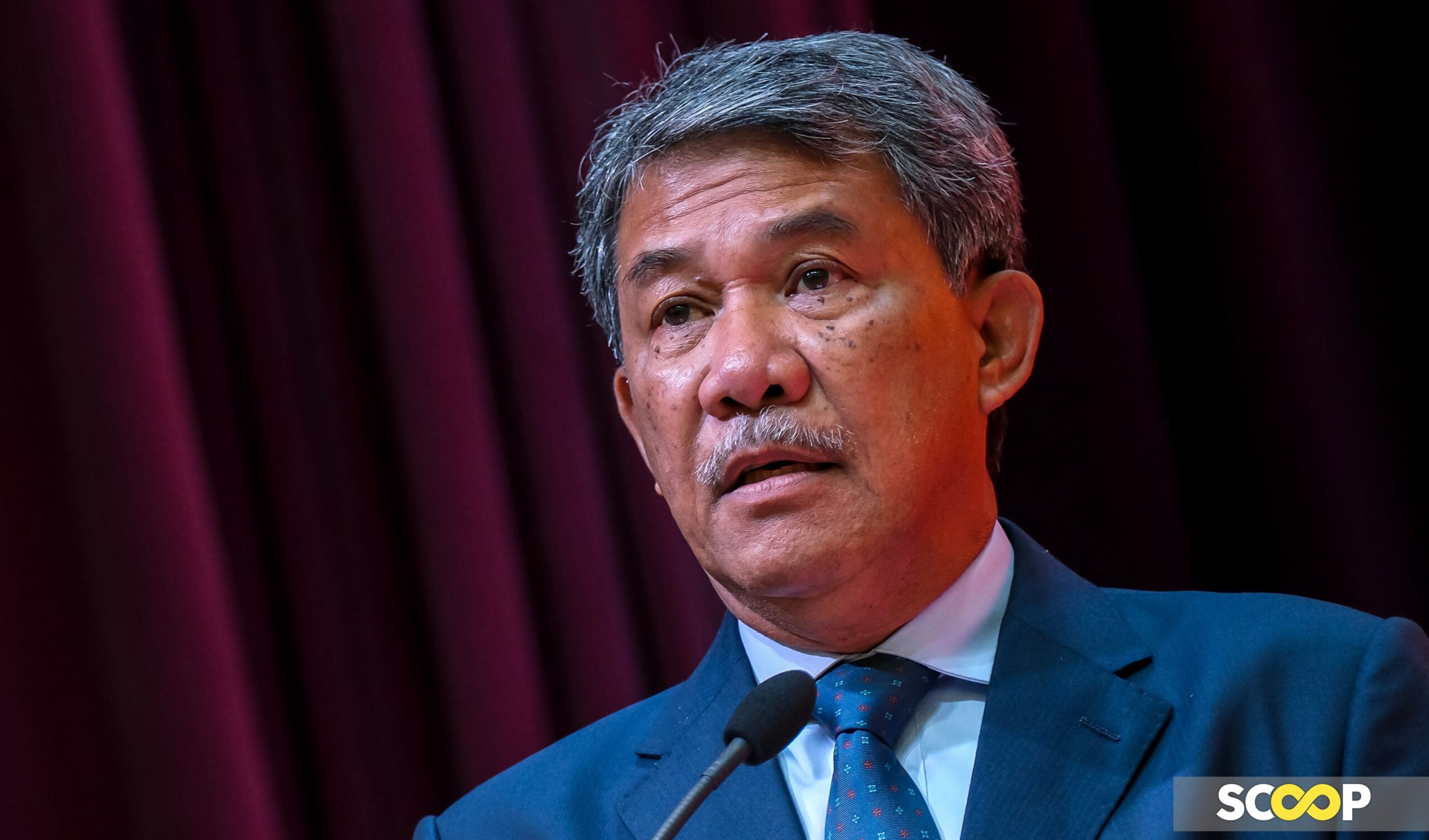 Foreign Minister Tok Mat asks to be fined for smoking at eatery | Scoop