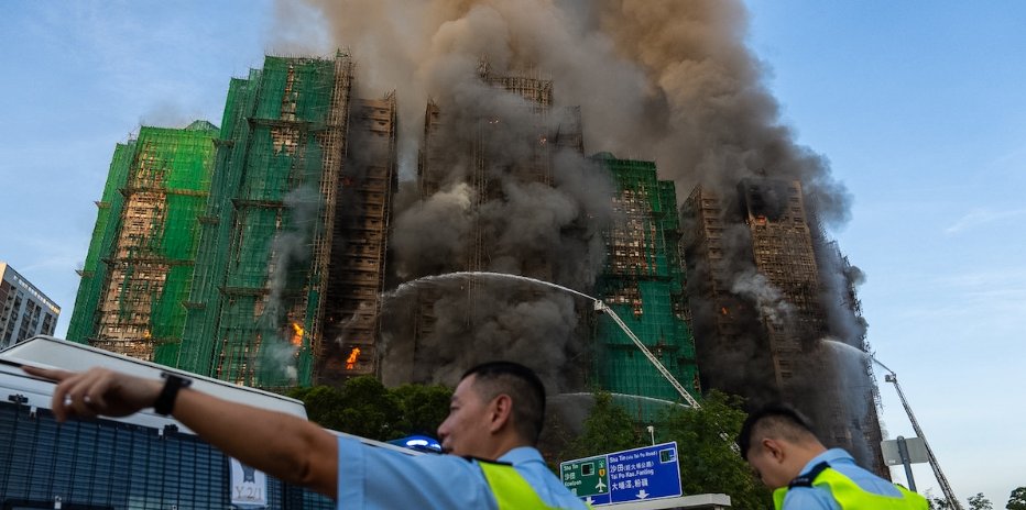Five dead, including firefighter, in massive apartment blaze at Hong ...